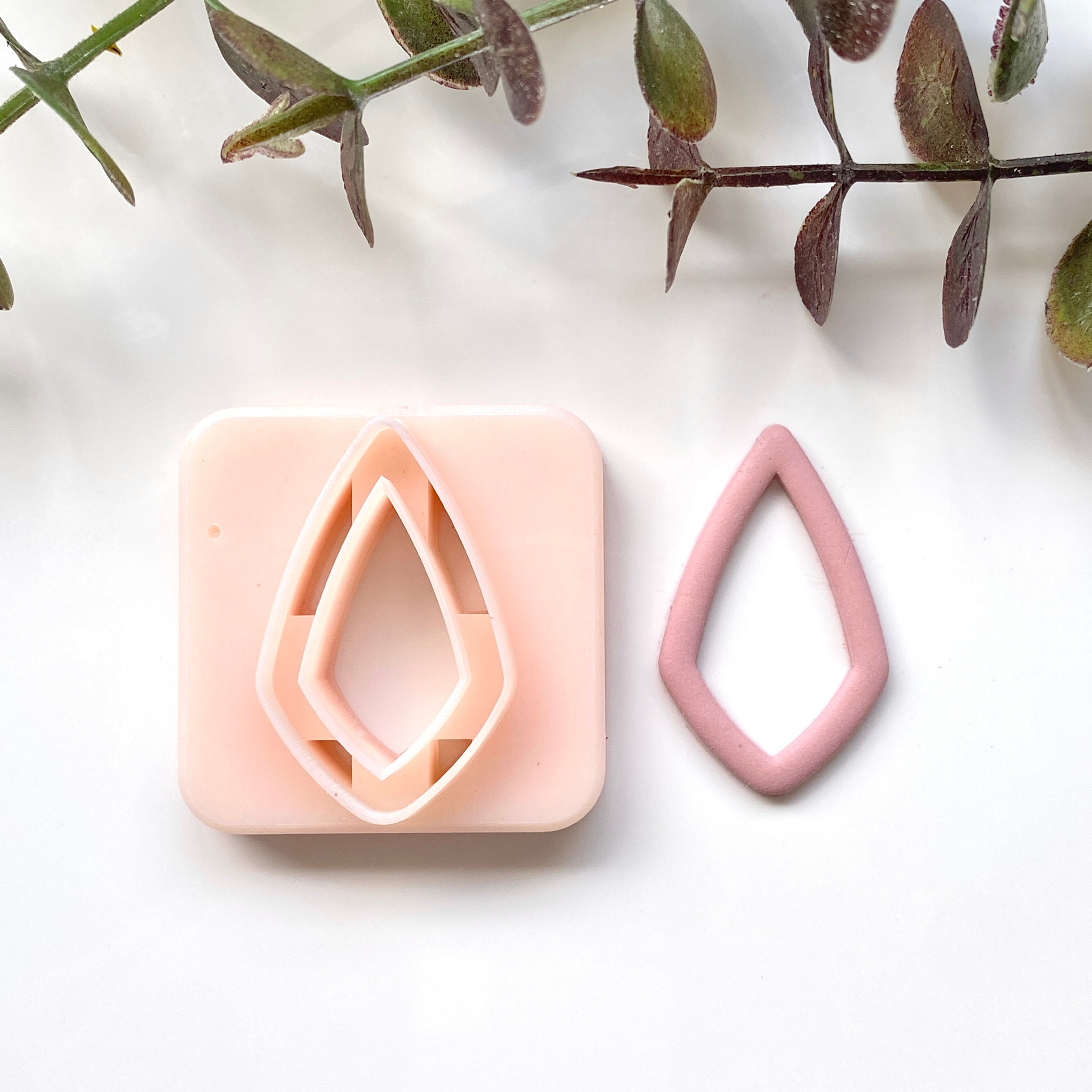 Poofy Long Diamond Bezel – Cutterglobe